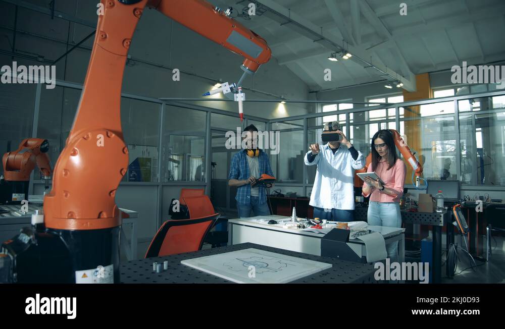 Virtual experiment with a robotic arm is being held by the researchers ...