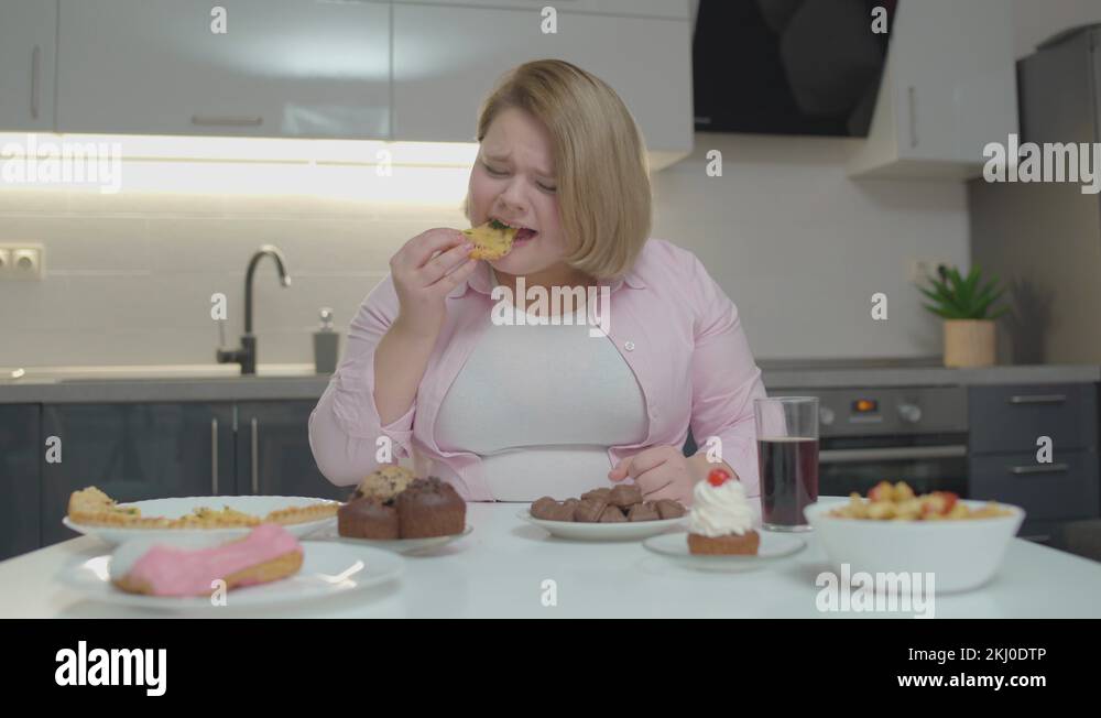 Fat woman cakes Stock Videos & Footage - HD and 4K Video Clips - Alamy