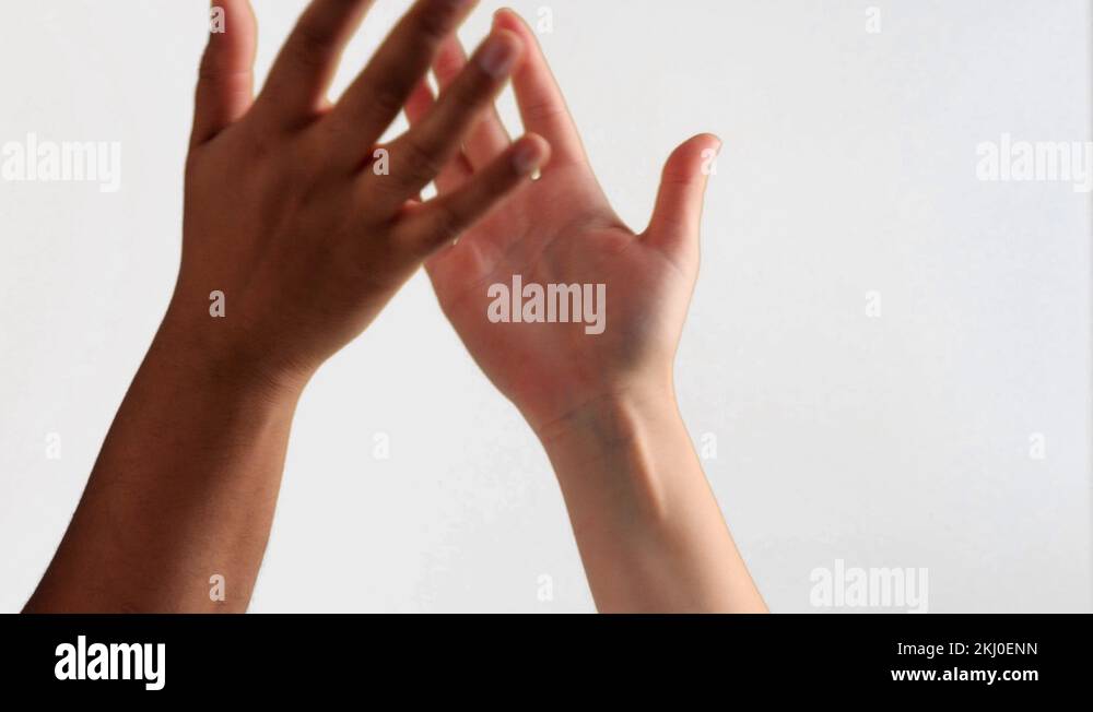 arm wrestling between male hand and female hand with different skin ...