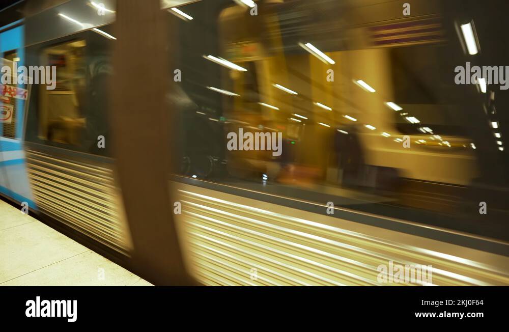 Moving subway train. Underground train departs from modern subway ...
