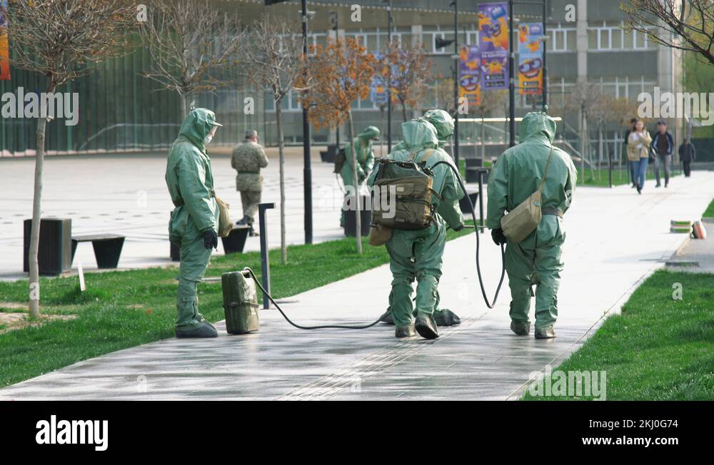 COVID-19 outbreak. Medical workers in bio viral hazard protective suits ...