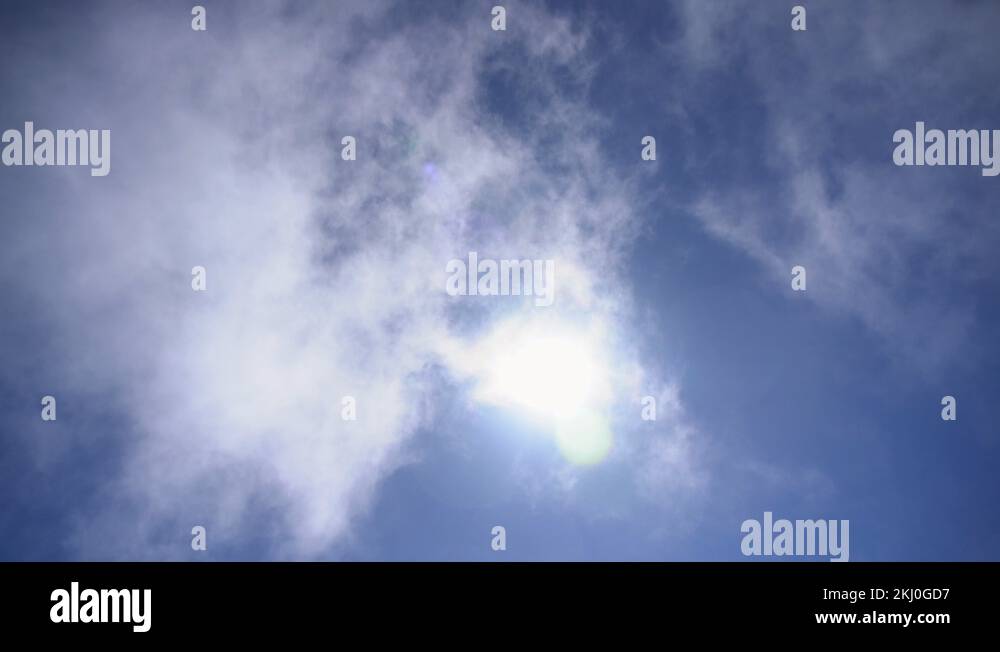 Blue sky clouds and emerging sun Stock Videos & Footage - HD and 4K ...