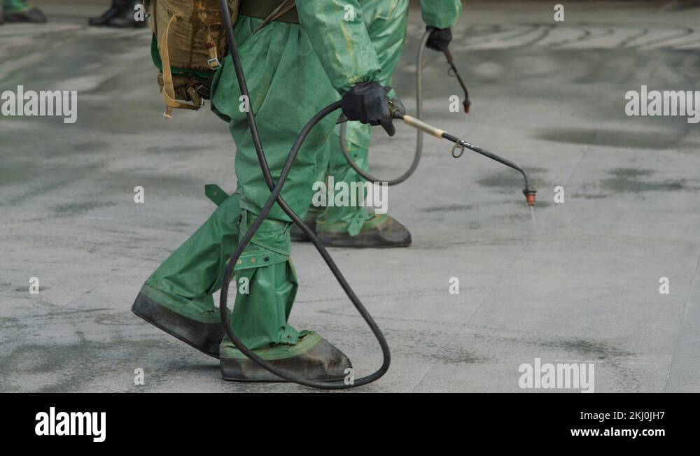 Hazard suit workers Stock Videos & Footage - HD and 4K Video Clips - Alamy