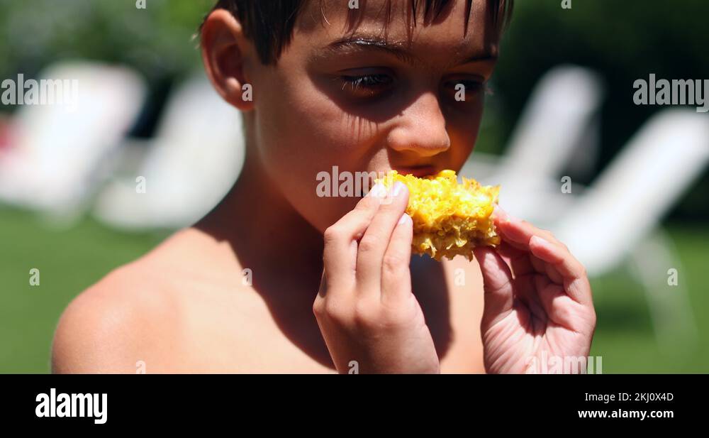 Kid eating corn Stock Videos & Footage - HD and 4K Video Clips - Alamy