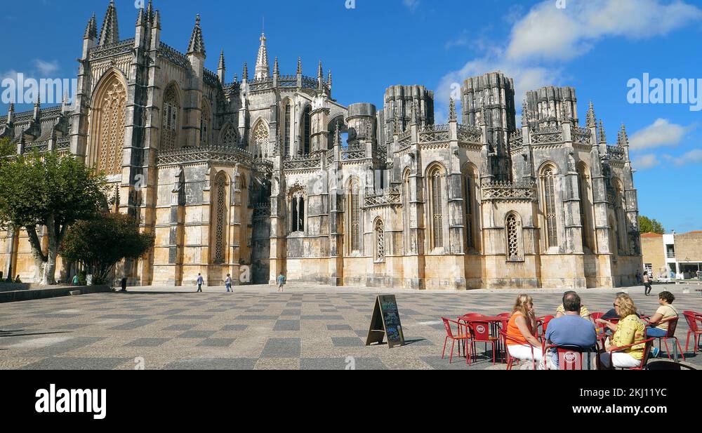 Tourists enjoy view of Monastery of Batalha Abbey in Portugal, 4K Stock ...