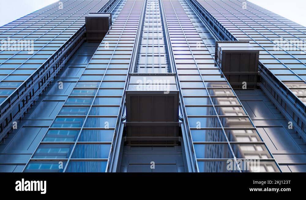 Exterior elevator cabins traveling upwards on a skyscraper glass facade ...