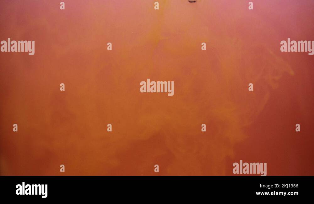 Paint floating in water looking like majestic nebulas. Stable shot with ...