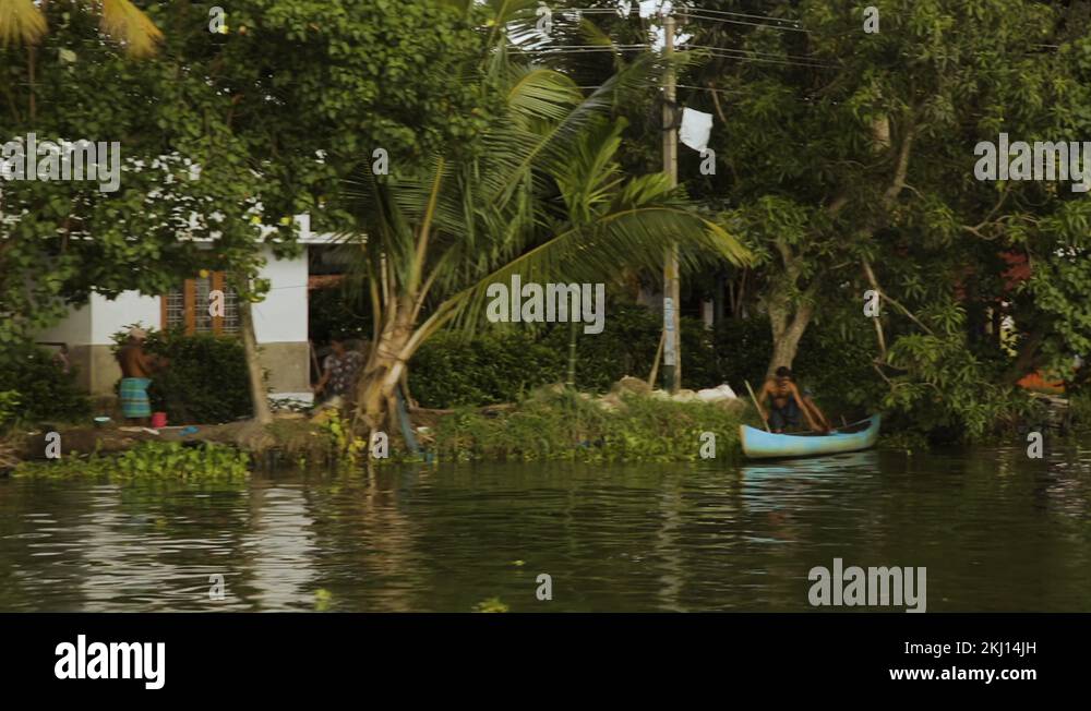 A glimpse of local lifestyle on the shores of the Kerala backwaters in ...