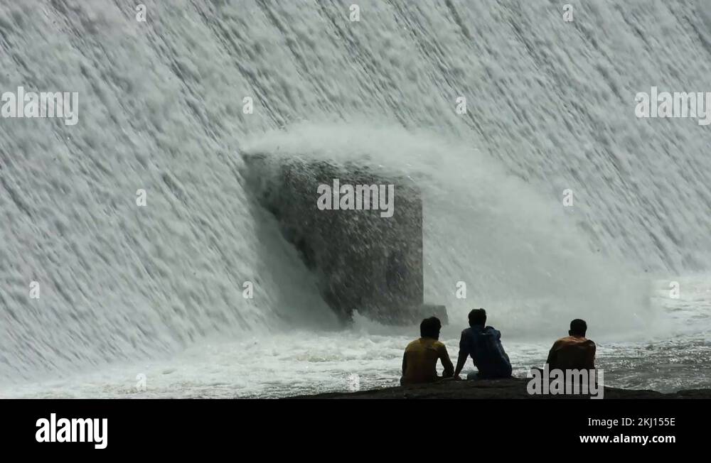 Dam with floodgate, Dam with water overflow, kids playing with water ...