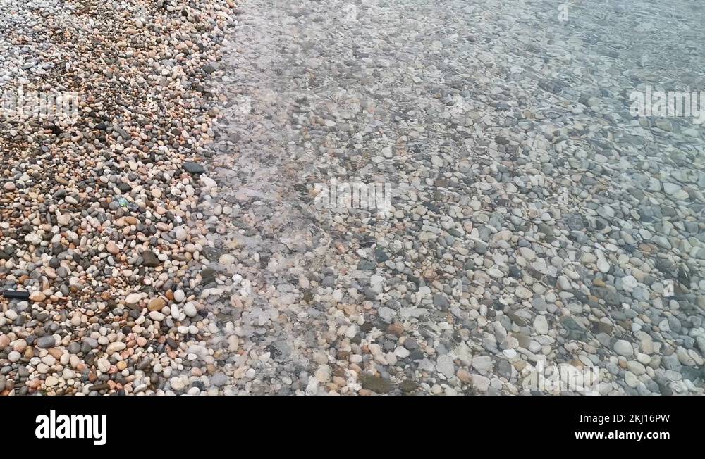 Transparent sea water with pebbles top view 4K Stock Video Footage - Alamy
