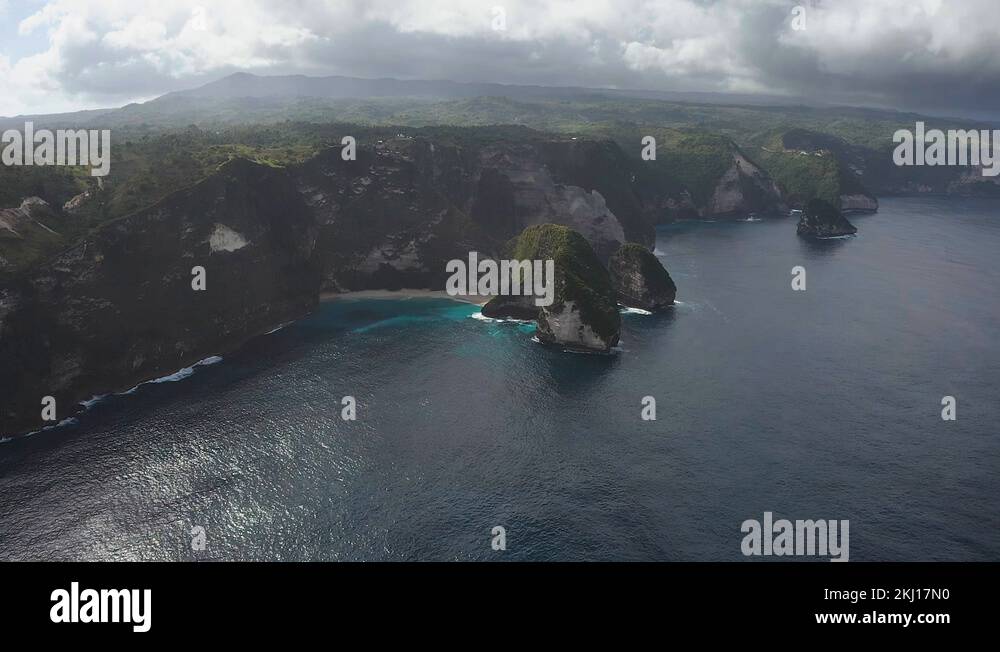 Drone video of the famous Kelingking T-Rex shaped beach in Nusa Penida ...