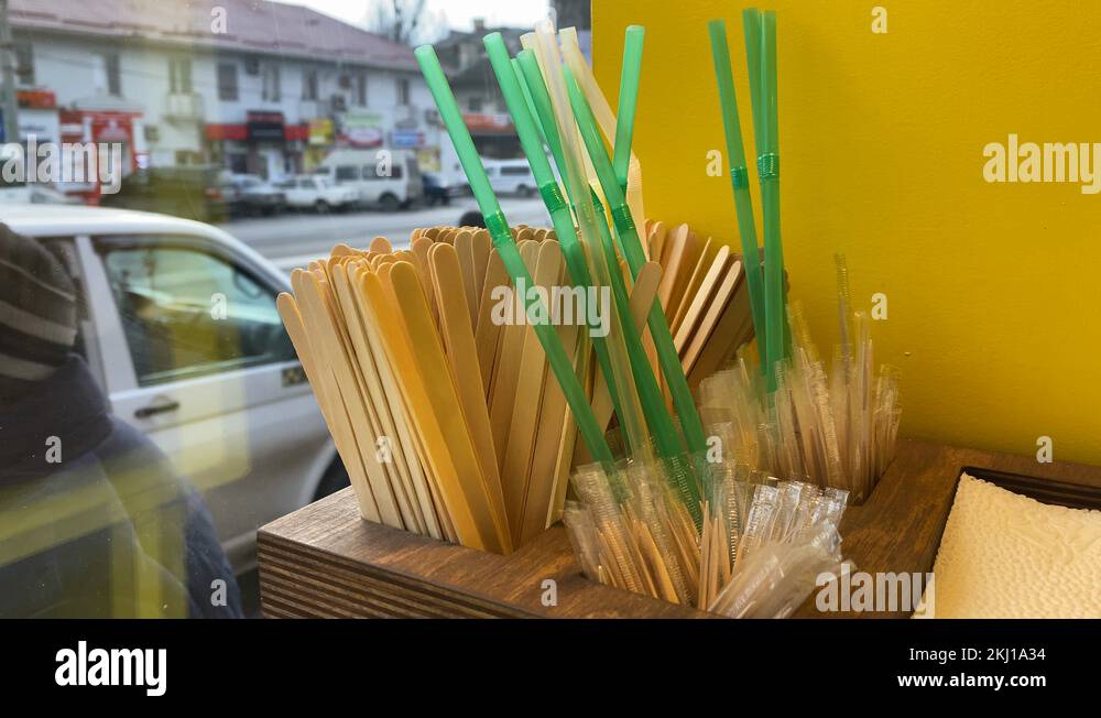 Bar counter in coffee shop, view through cafe window on a city street ...
