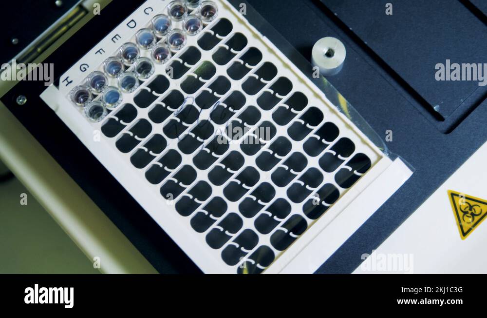 Covid-19 coronavirus detecting process. Top view of a shaking tray with ...