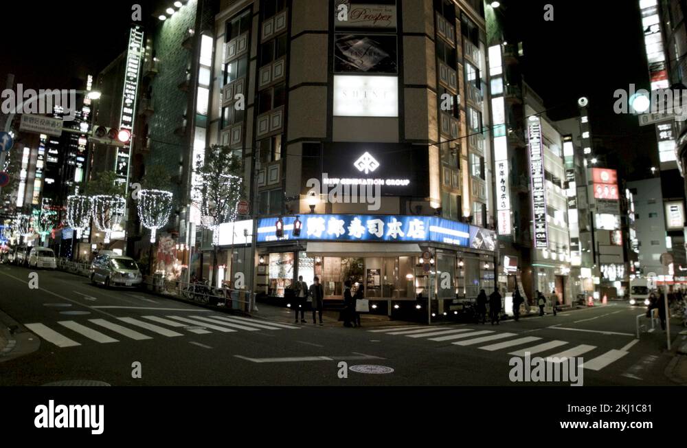 Jewelry diamond store in Akihabara at night with cars and people ...