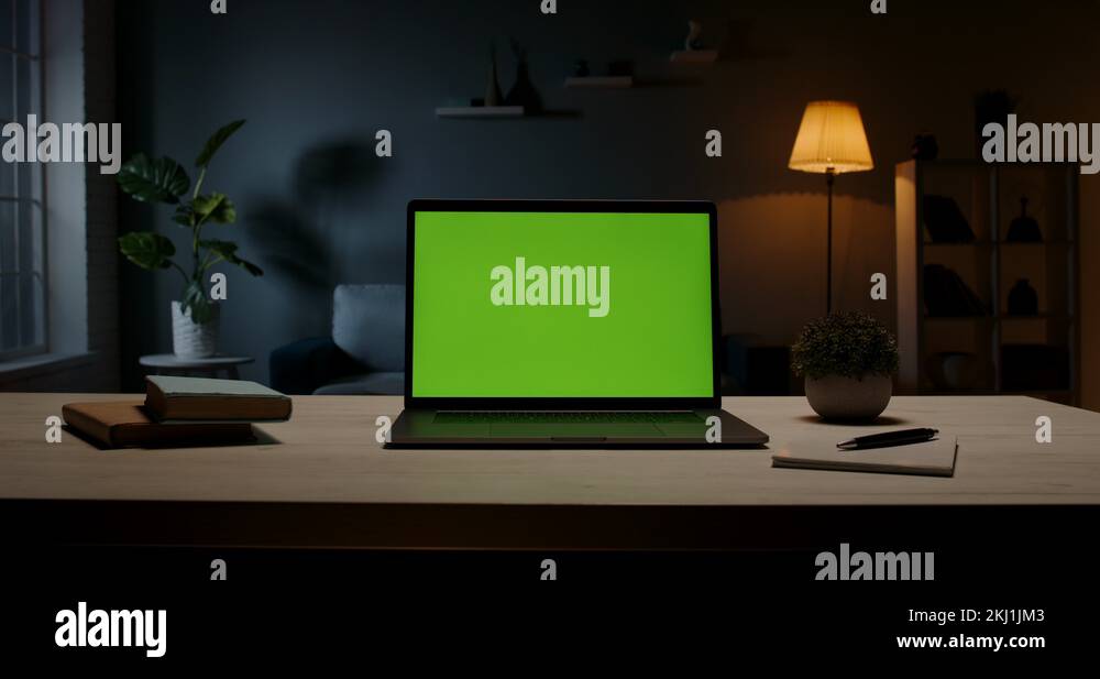 Close up shot of modern chroma key green screen laptop computer set up ...