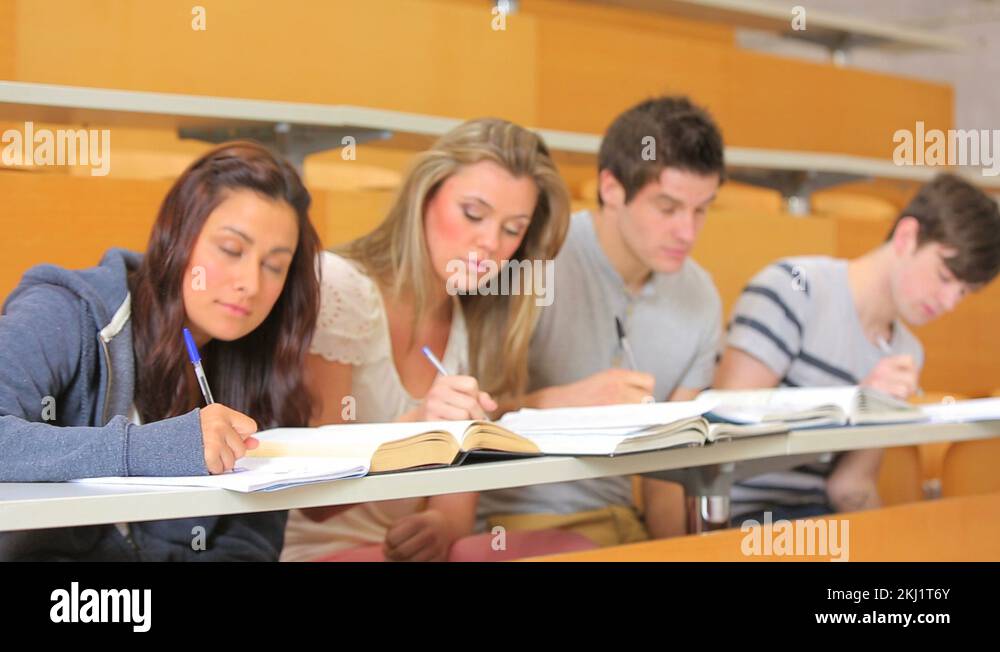 Students writing together Stock Videos & Footage - HD and 4K Video ...