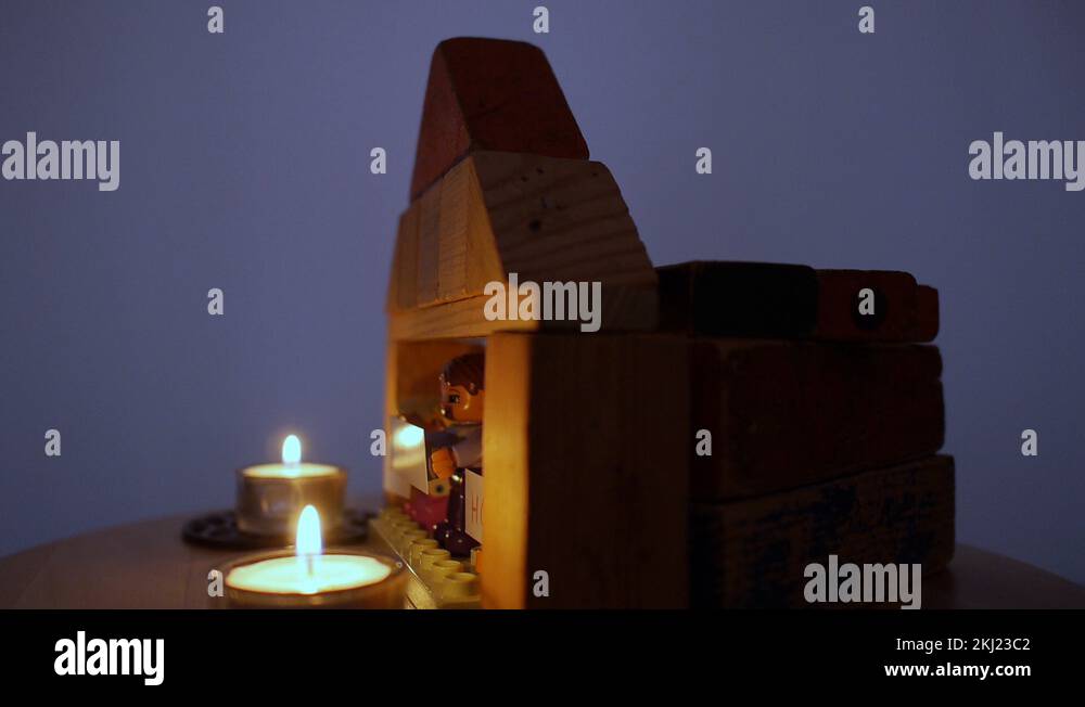 Lego men holding posters STAY AT HOME in a tattered toy house Stock ...