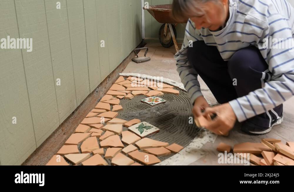 Tile setting Stock Videos & Footage - HD and 4K Video Clips - Alamy