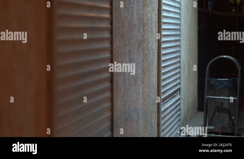 Storefront roller shutter door Stock Videos & Footage - HD and 4K Video ...