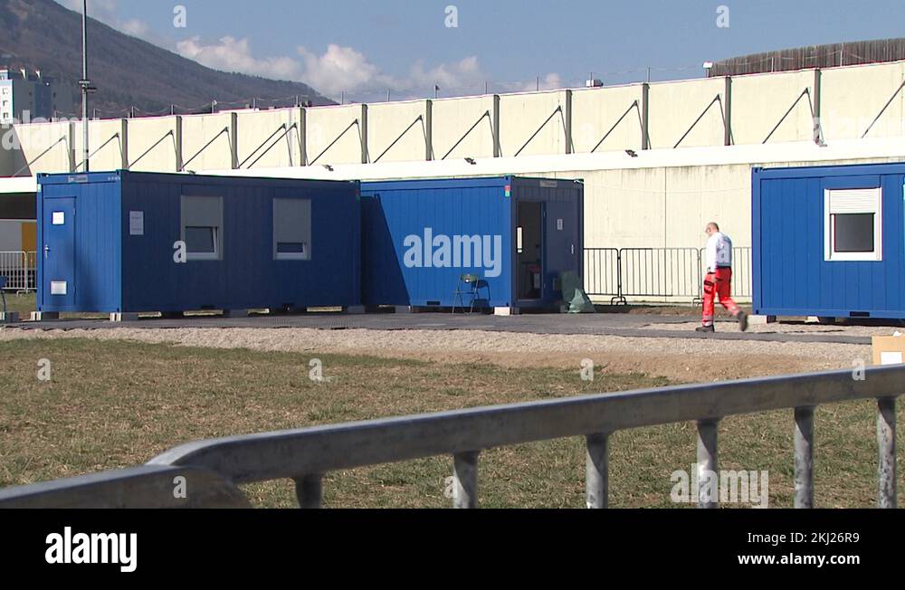 Temporary containers set outside emergency room to measure body Stock ...