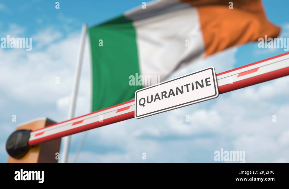 Open boom gate with QUARANTINE sign on the Irish flag background ...