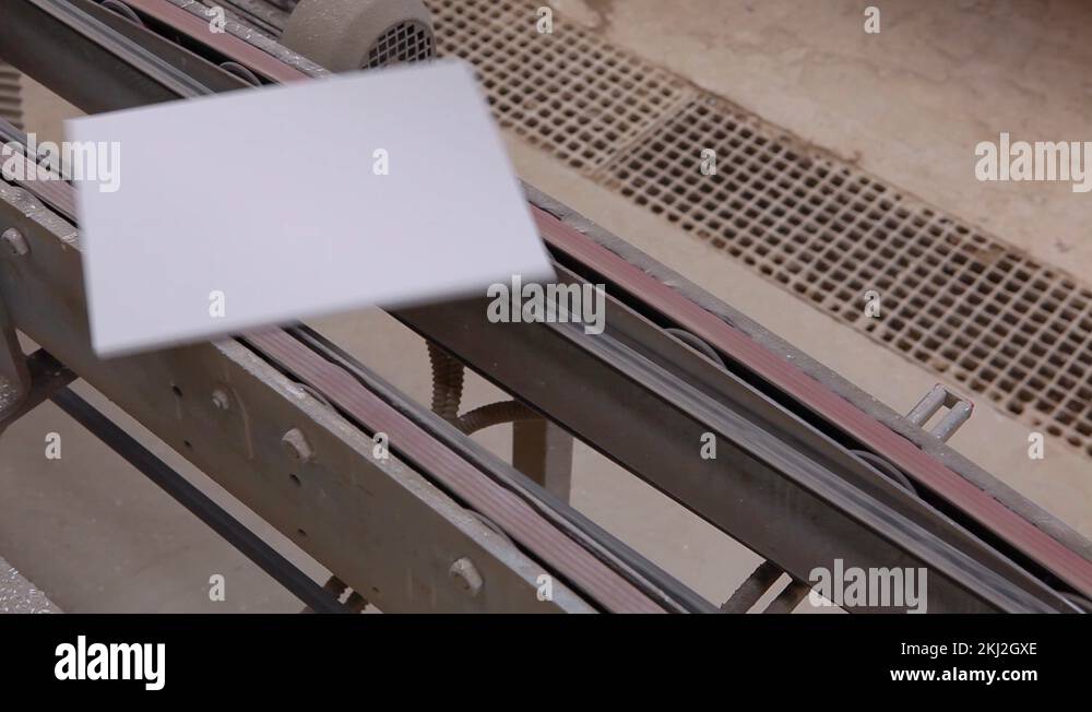 The process of making modern tiles. Ceramic tile at a modern factory ...