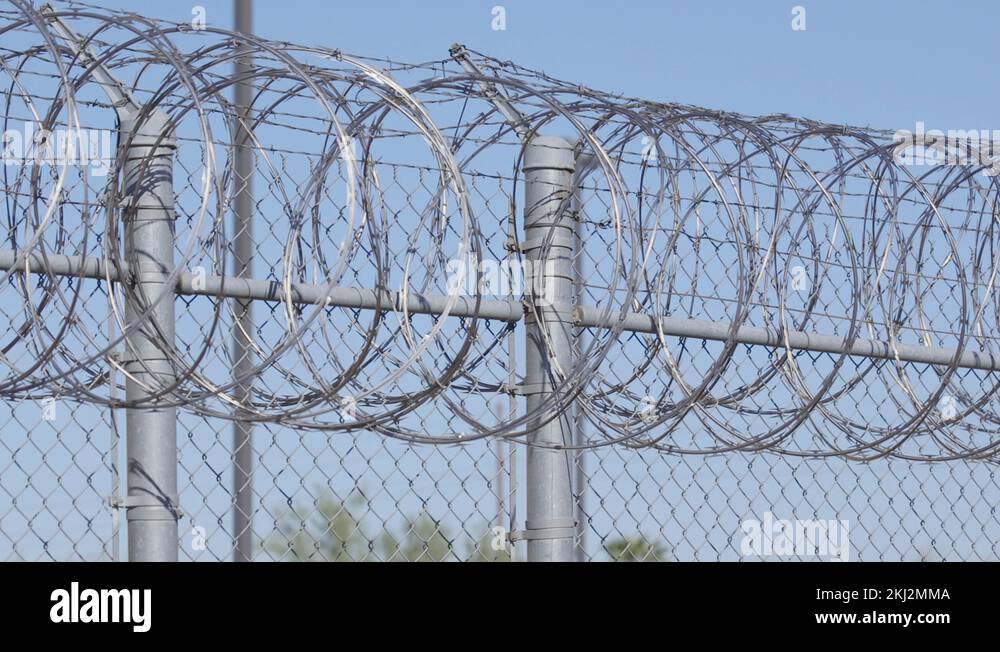 Fence barbwire barrier prison jail Stock Videos & Footage - HD and 4K ...
