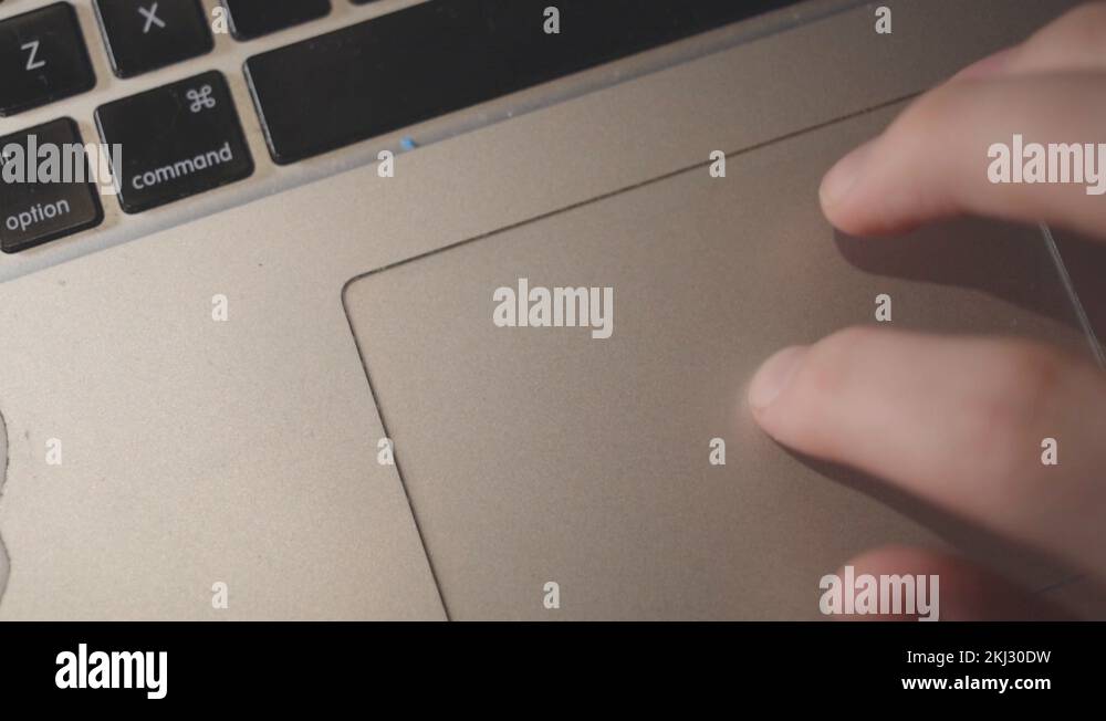 Closer Look On Fingers Scrolling On The Trackpad Of A Modern Laptop ...