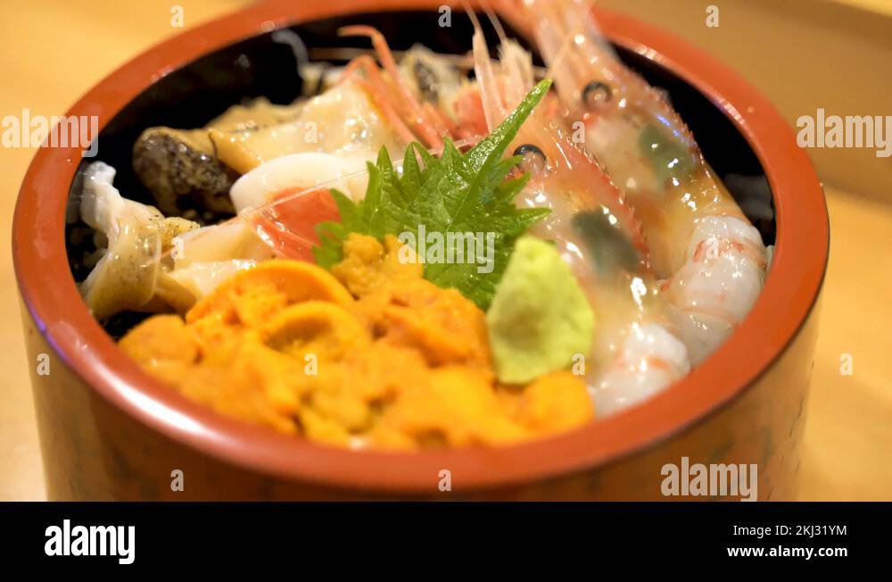 Traditional Japanese raw fish on rice dish Kaisendon at a sushi ...