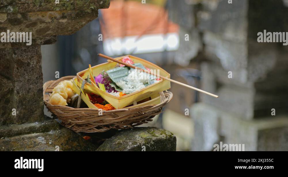 Close up shot of balinese baskets with various offerings for hindust ...