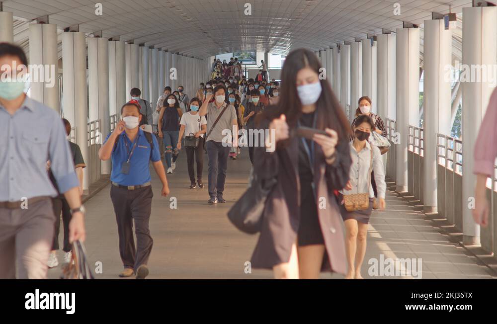 Crowded Asian people wear face mask on pedestrian walk. Coronavirus ...