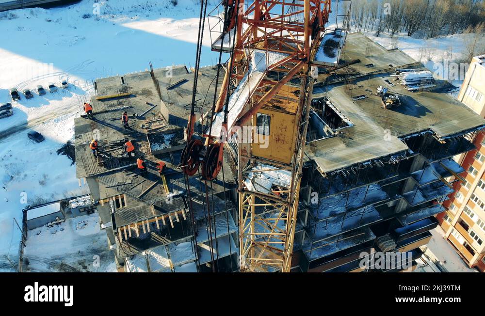 Building lot with a multistory house and workers operating on it Stock ...