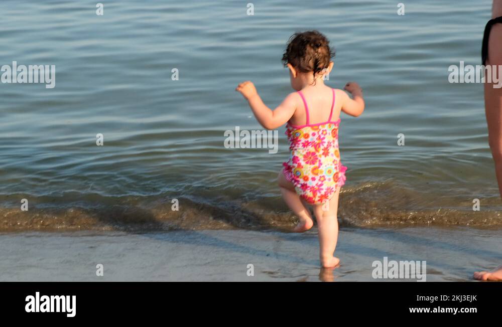 Little GIrl Running into Sea, fails and splash the water Stock Video ... Little GIrl Running into Sea, fails and splash the water Stock Video ...