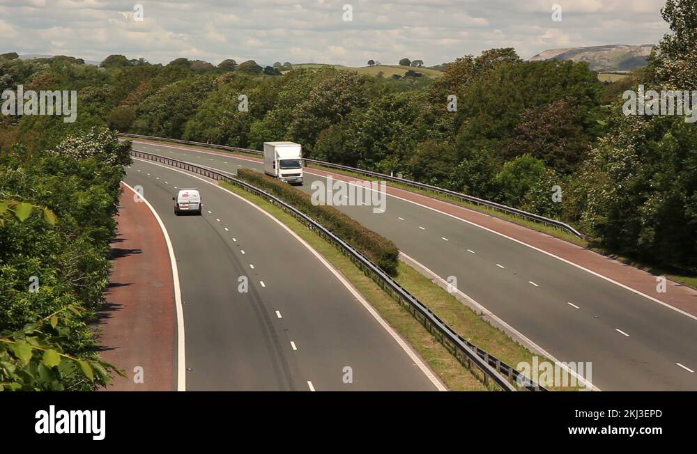White Truck / Lorry driving on a Dual Carrigeway Road in Summer ...