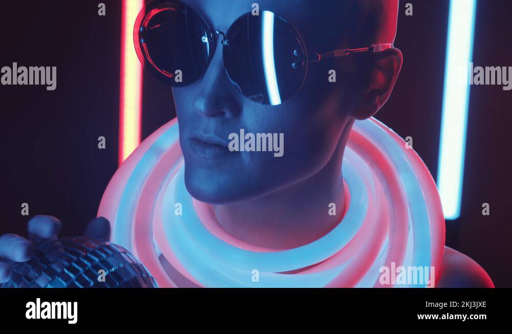 Female Model with Shaved Head Posing with Disco Ball in Neon Light ...