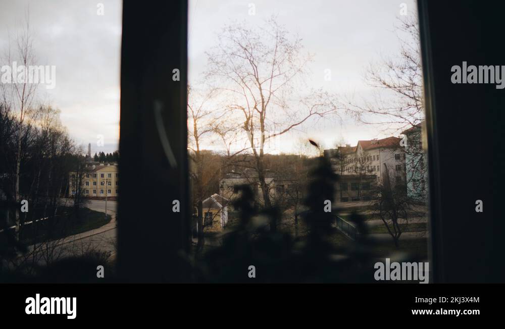 Morning. Dawn. View from the window of the rising sun in an ordinary ...