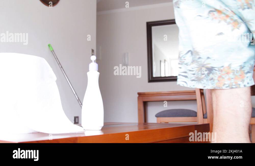 Man covering his face with pollution mask for protection cleaning his ...