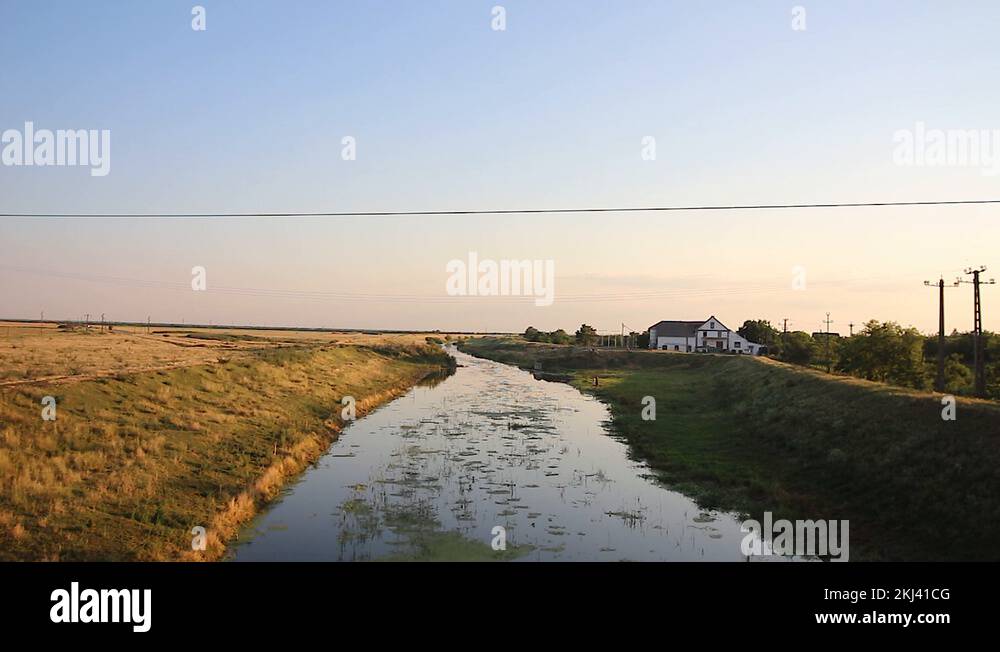 Village river scene Stock Videos & Footage - HD and 4K Video Clips - Alamy