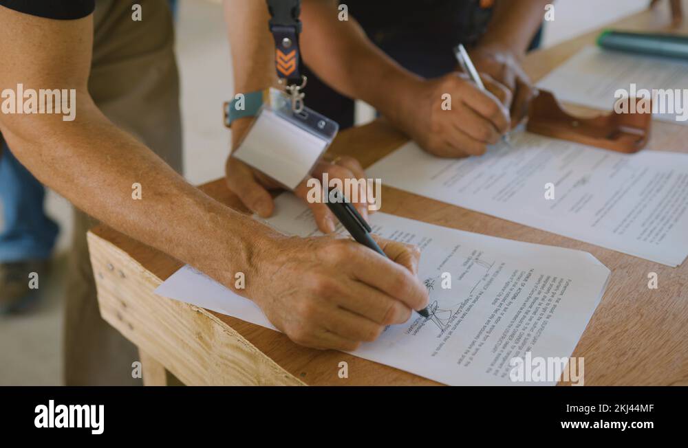 Signing a Document for Construction Stock Video Footage - Alamy