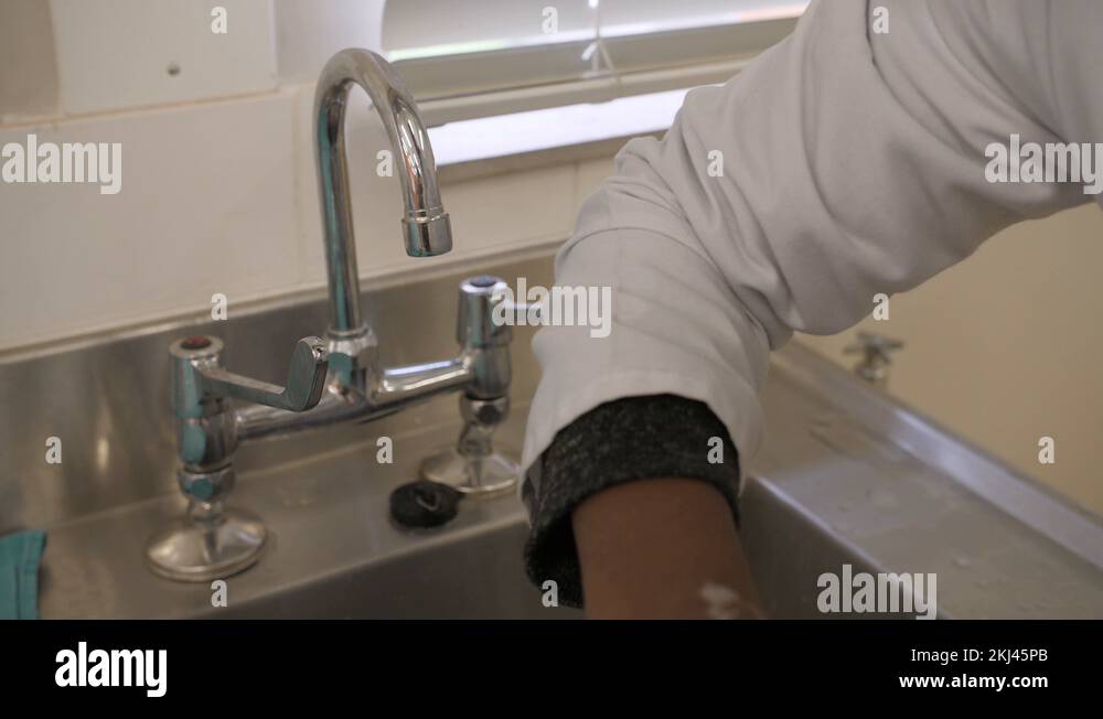 Proper hand washing technique, step 8: Rinse hands under running water ...