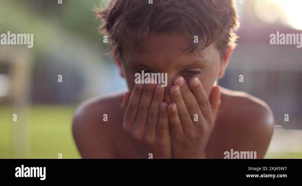 Boy covering face with hands Stock Videos & Footage - HD and 4K Video ...