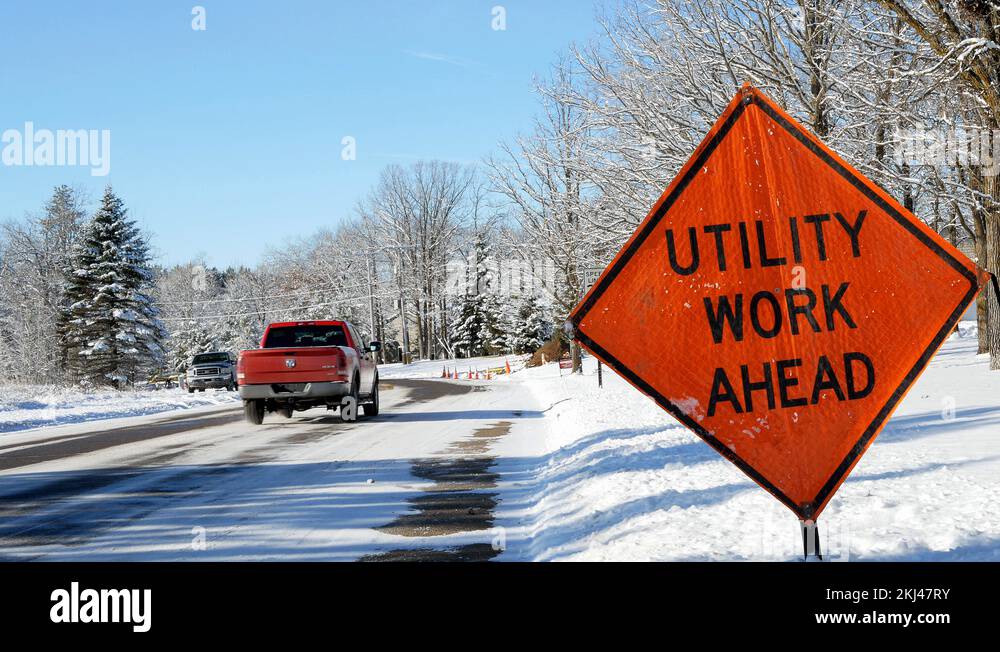 BEMIDJI, MN - 22 NOV 2019: UTILITY WORK AHEAD sign on street near work ...