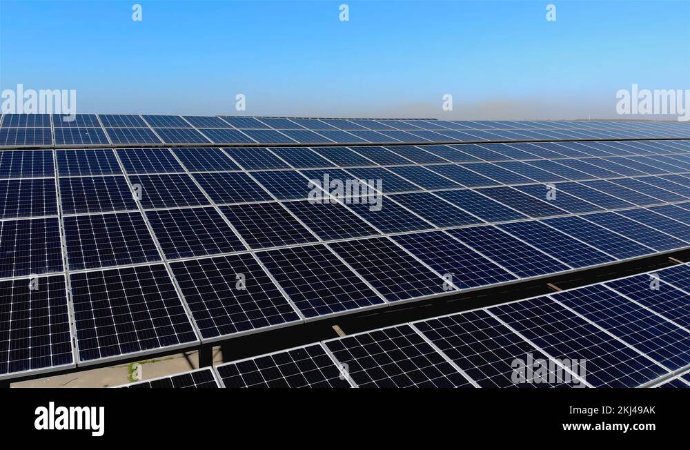 Drone rise up above power generation by solar panels of different types ...
