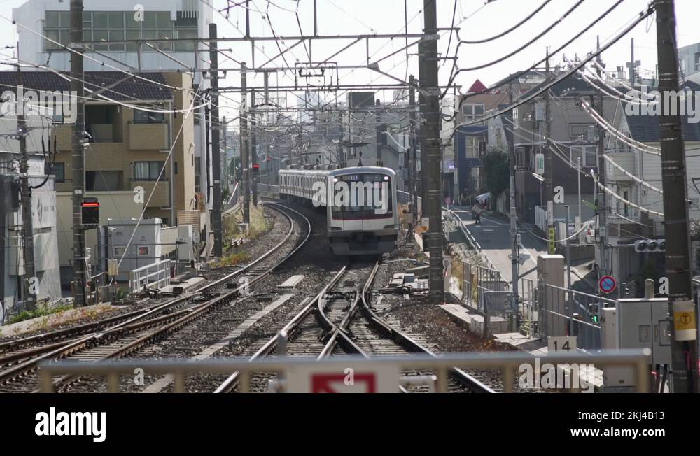Train Approaching The Platform At The Station Slow Motion In Tokyo ...