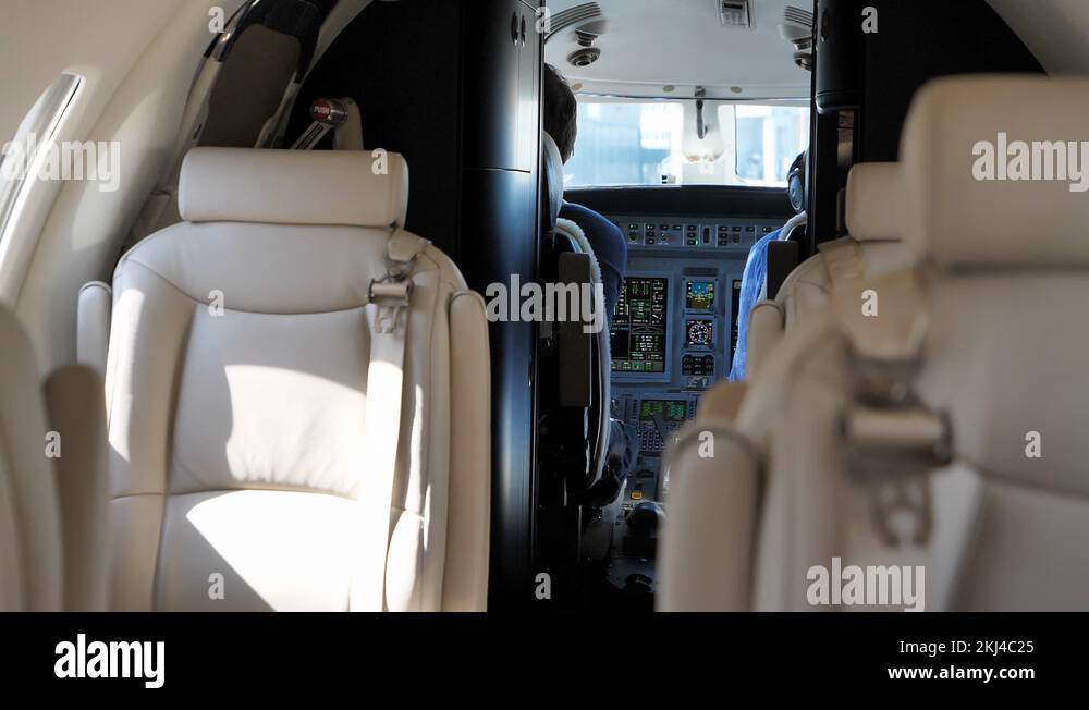 Pilots in Cockpit of Business Jet, View from Cabin SLOMO Stock Video ...