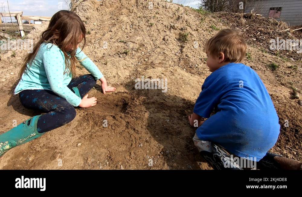 Kids playing with soil Stock Videos & Footage - HD and 4K Video Clips ...