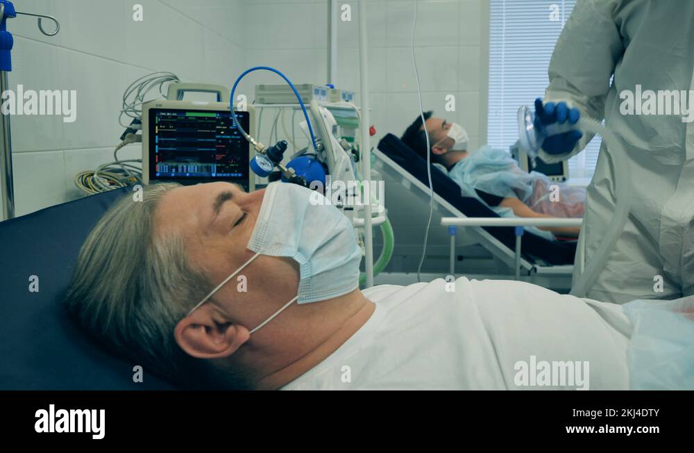 Oxygen mask is being given to a sleeping male patient Stock Video ...