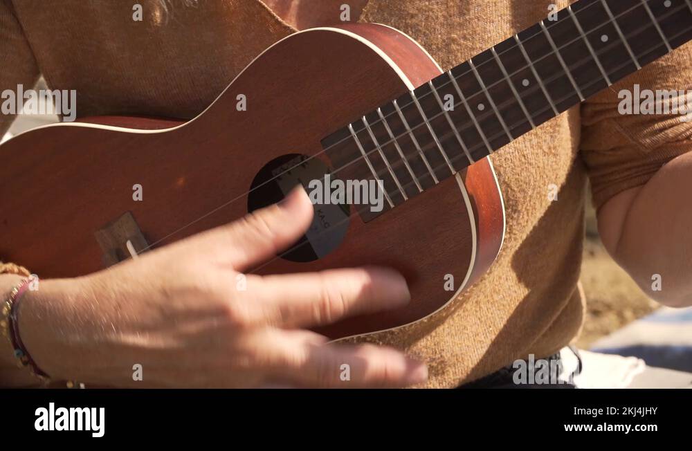 Ukulele playing Stock Videos & Footage - HD and 4K Video Clips - Alamy