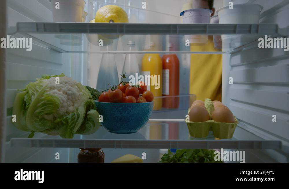 Camera Inside Kitchen Fridge Man Opens Fridge Door, Looks inside Takes ...
