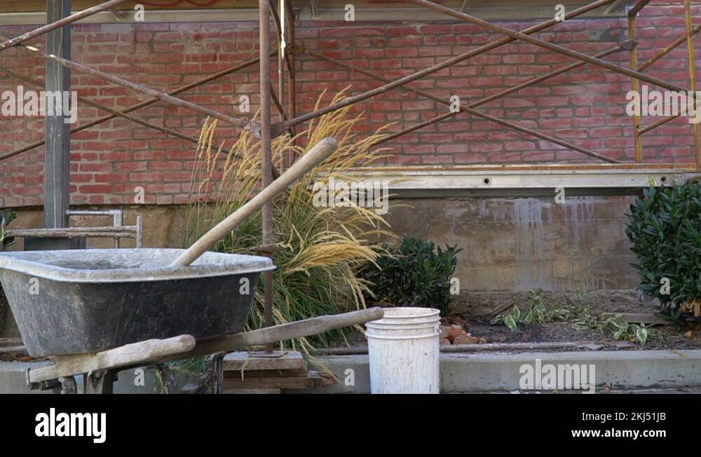 Shovel, Mortar Basin, Bucket, And Scaffoldings Left In The Jobsite ...